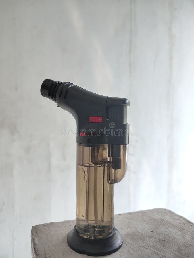 A Black Fire Lighter, Torch Stock Image - Image of fire, machine: 284540387