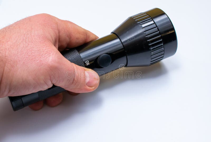 Black Flashlight Held in the Hand Stock Photo - Image of illuminate ...