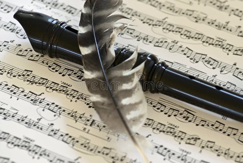 Black Flute and Feather on Musical Note Background Stock Photo - Image ...