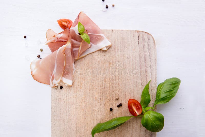 Black Forest Ham on Wooden Cutting Board Stock Photo - Image of green ...