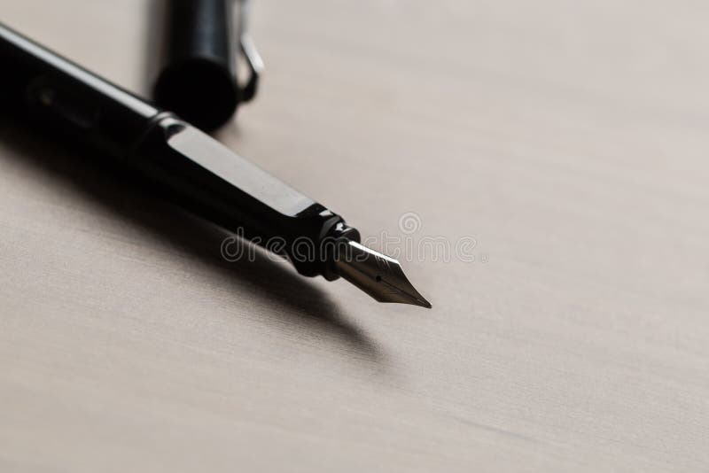 Fountain pen on table stock photo. Image of copy, classic - 140718492
