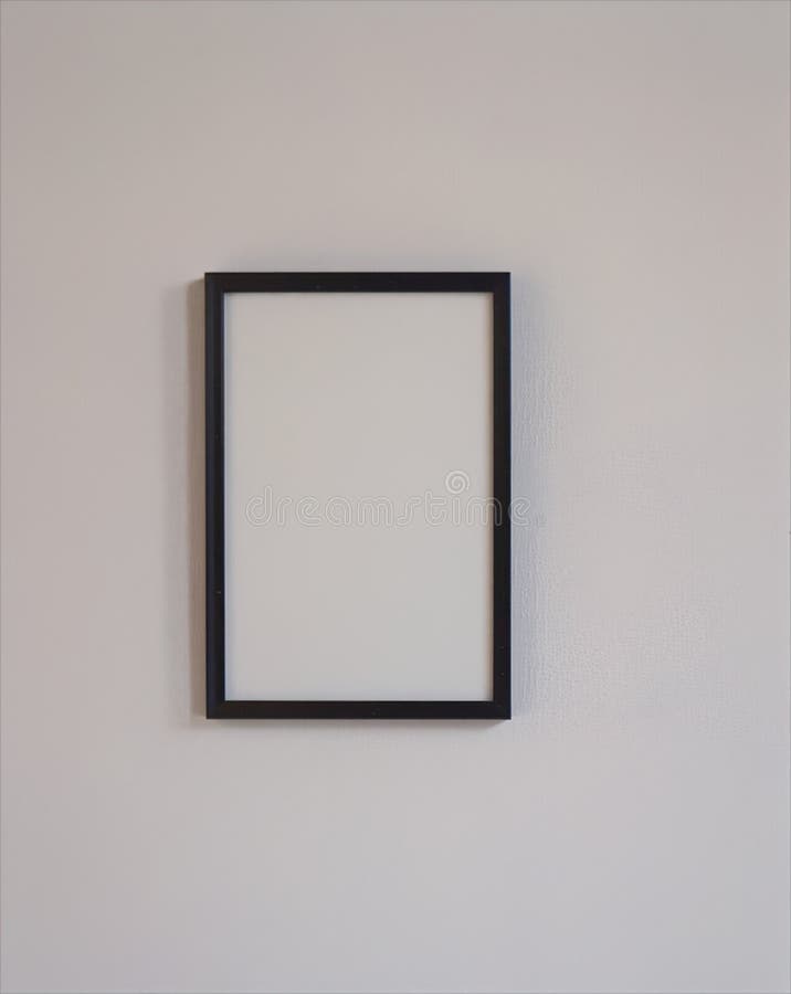 A Black Frame with a Sleek Border on a Light-colored Wall, Showcasing ...
