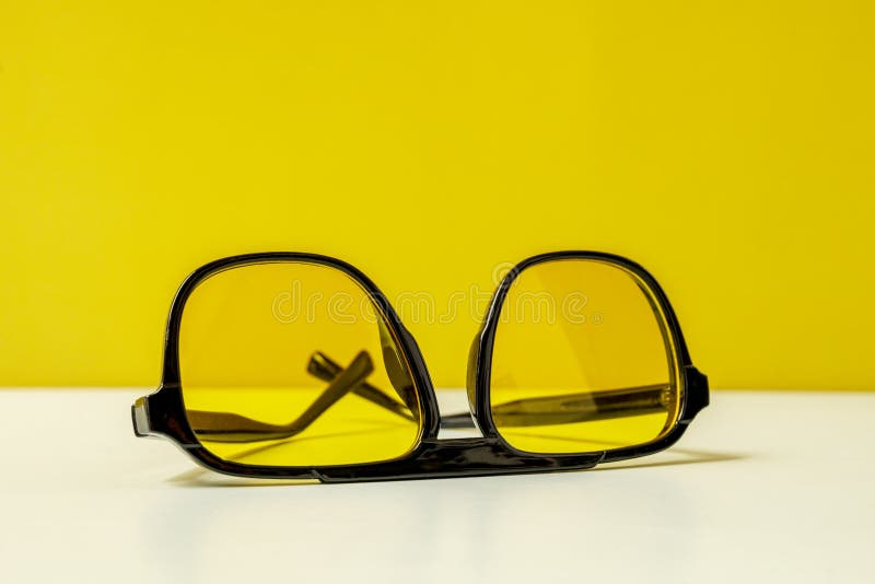 Black Frame Sunglasses with Yellow Lenses Stock Image - Image of vector ...