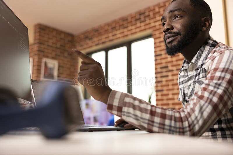 Black Freelancer Developing Software Using Multiple Device Screens Stock Photo - Image of ...