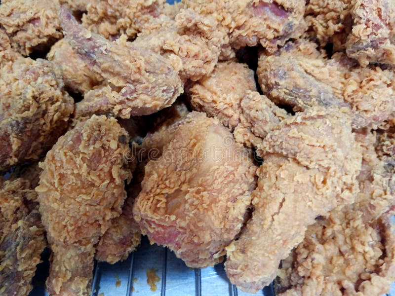 Black fried chicken stock image. Image of icing, food - 240803955