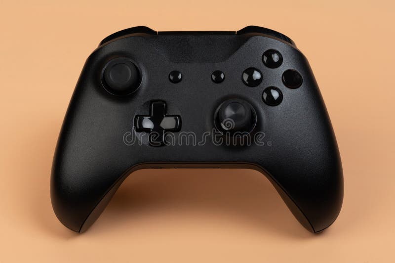 Black Game Controller Gamepad with Pink Buttons on Black Background ...
