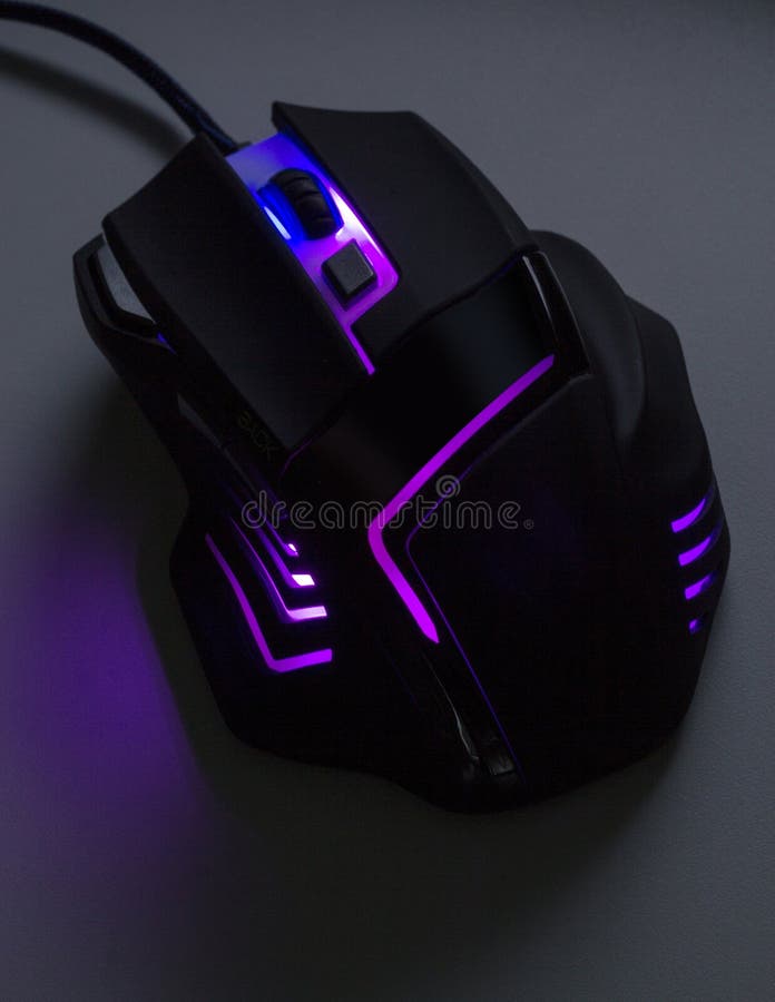 A Black Gaming Mouse with a Purple Light Stock Image - Image of ...