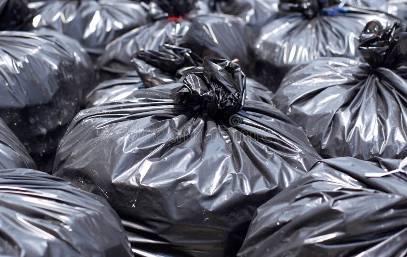 Black Garbage Bag on the Street Stock Image - Image of cleaner, curb ...