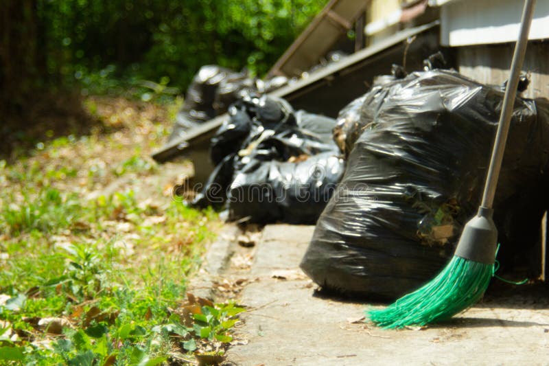 Black Garbage Bags. Garbage in Bags Stock Image - Image of lawn, water ...