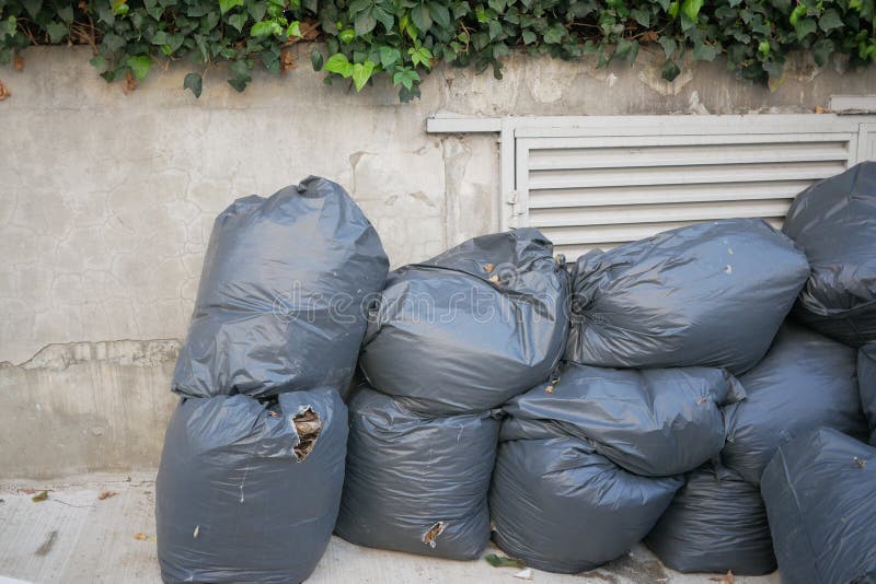 Black Garbage Bags Stack on a Park Stock Photo - Image of dump, duty ...