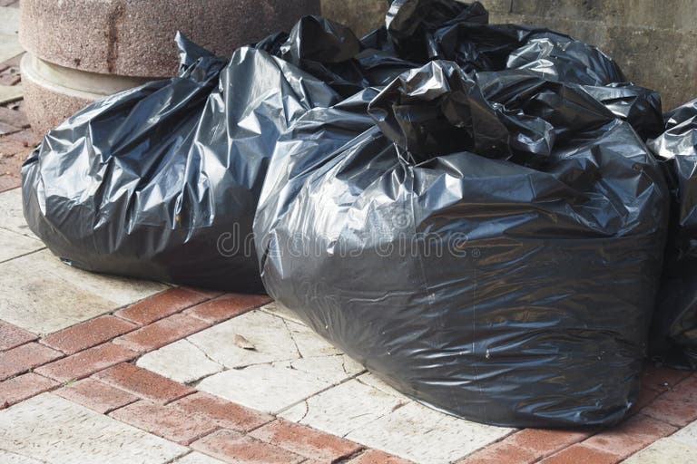 Black Garbage Bags Stack on a Park Stock Image - Image of environment ...