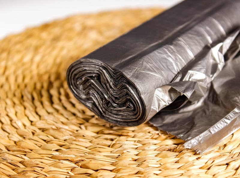 Black Garbage Bags Wrapped in a Roll Stock Image - Image of expanded ...