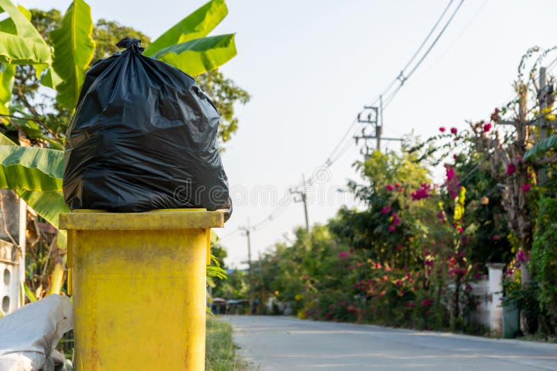 Black Garbage Placed on the Side of the Road Stock Image - Image of ...