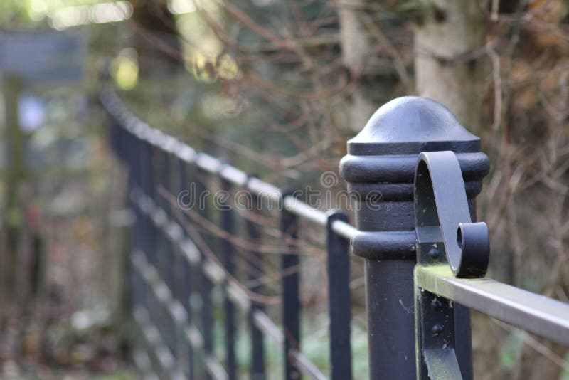 Black Gate Post and Gate with Scrolling Feature Stock Photo - Image of ...