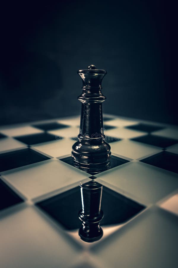 Black Glass Queen Chess Piece on Glass Chess Board Stock Photo - Image ...