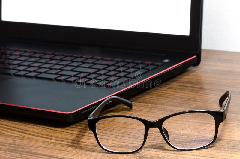 Black Glasses and Laptop Computer Stock Photo - Image of electronic ...