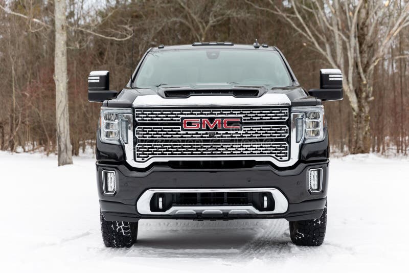 Black GMC Truck Parked on a Concrete Surface in a Natural Setting ...