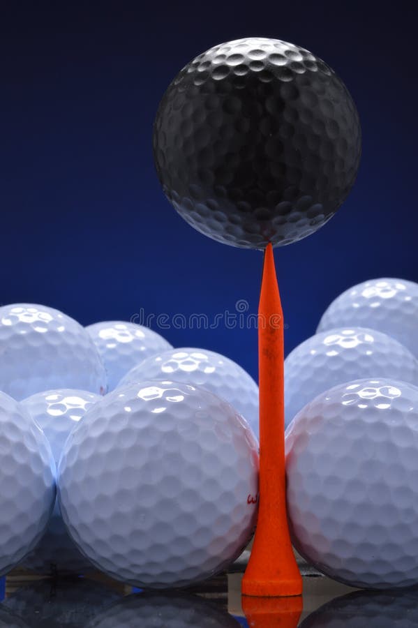 Black Golf Ball Balancing on Inverted Tee Stock Image - Image of sports ...