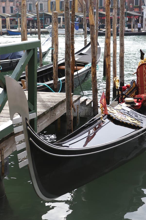 Black gondola in Venice editorial stock image. Image of reflection ...