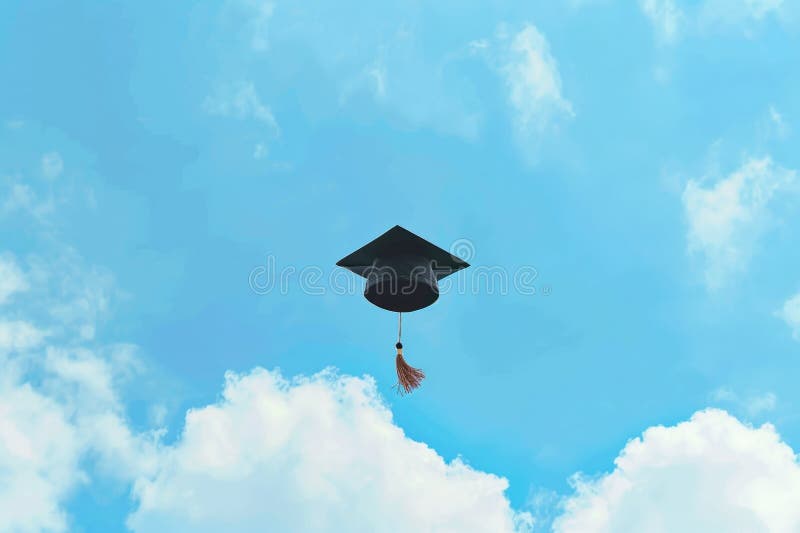 A Black Graduation Cap with a Purple and Yellow Tassel is Flying in the ...