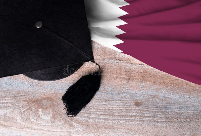 Black Graduation Hat on Qatar Flag, Education Concept, Top View Stock ...