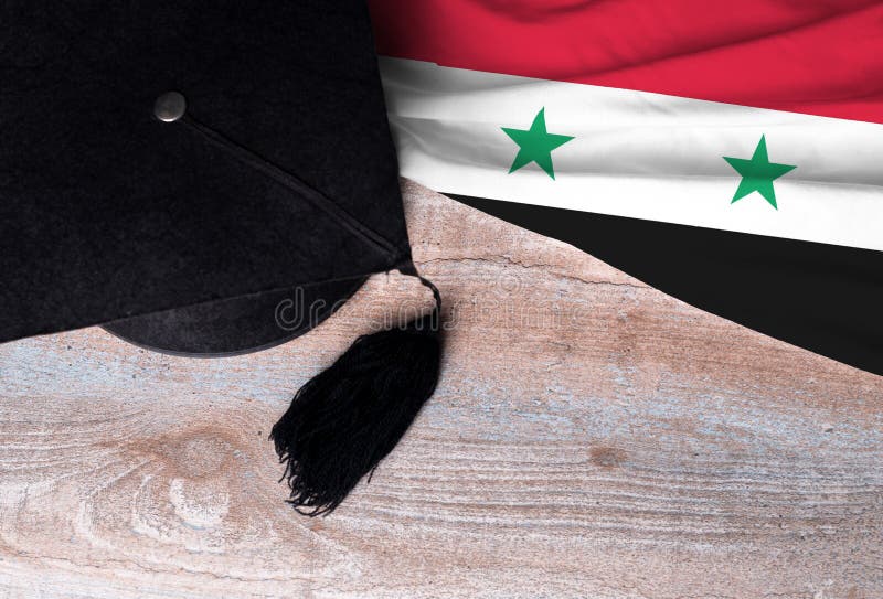 Black Graduation Hat on Syria Flag, Education Concept, Top View Stock ...