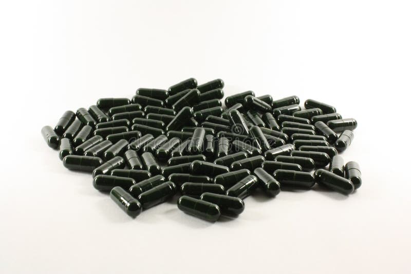 Black Green Capsule I stock image. Image of medicinal - 13856661