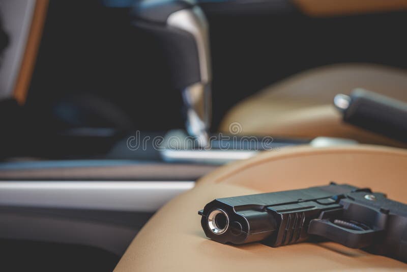 Black Gun Inside the Car. for Violence on the Road Concept Stock Image ...