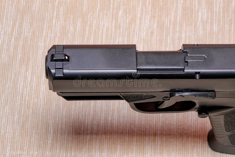 Black Gun Isolated on Light Coloured Background Stock Image - Image of ...