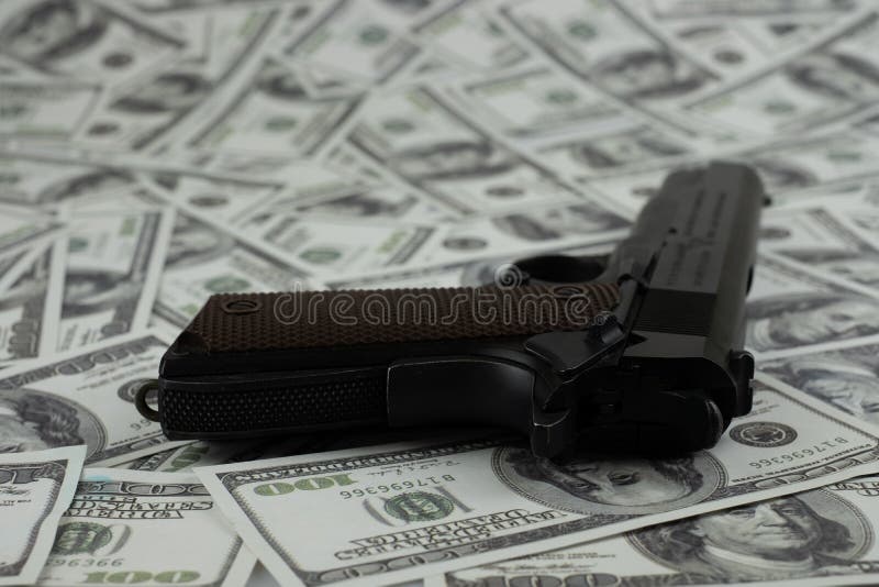 Gun Pistol On Stack Money 100 Dollars Background Stock Photo - Image of ...