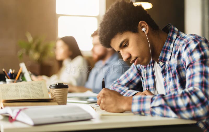 Black Guy Taking Notes, Preparing for Classes in Library Stock Photo ...