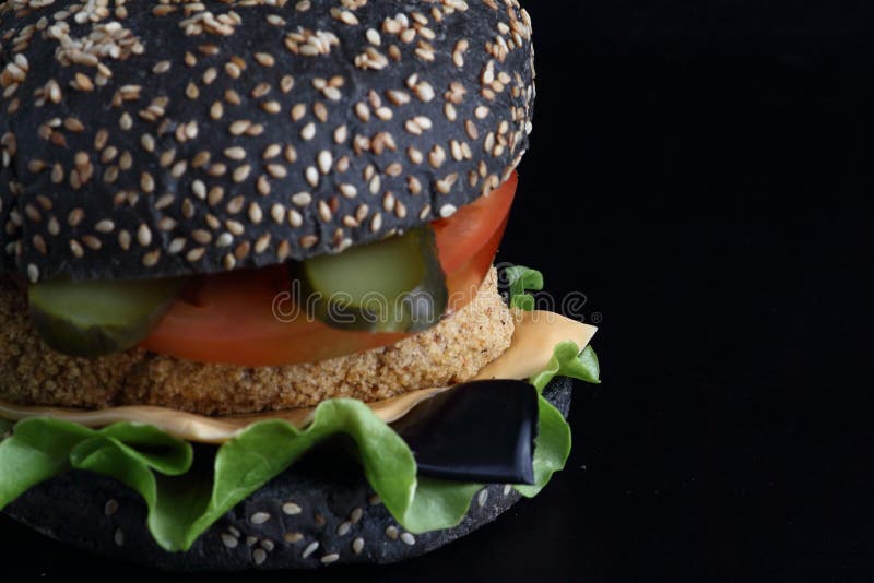 Black Hamburger on Black Background Stock Image - Image of background ...