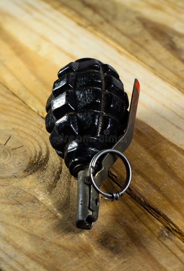 Black Hand Grenade on a Wooden Table Stock Image - Image of death, hand ...