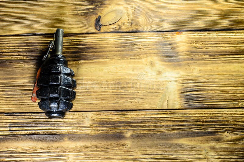 Black Hand Grenade on a Wooden Table Stock Photo - Image of explode ...