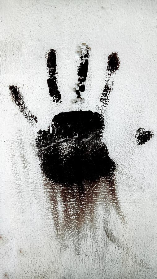 A Black Handprint Printed on a Textured White Wall Surface Stock Photo ...