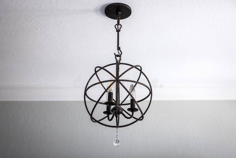 Black Hanging Sphere Modern Light Fixture Stock Image - Image of globe ...