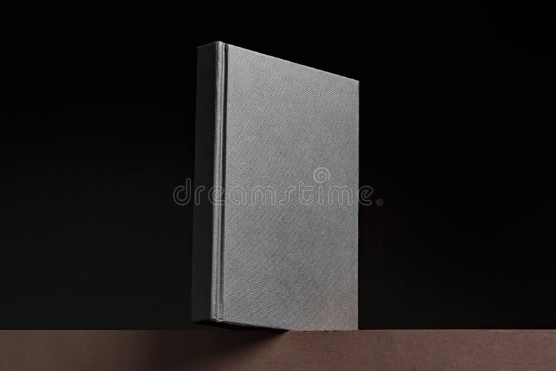 Black Hardcover Book or Notepad Mock Up on Black Background Stock Photo ...