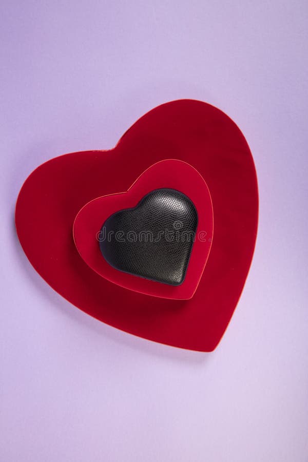 Black Heart Lies on Red Hearts, View from Above Stock Image - Image of ...