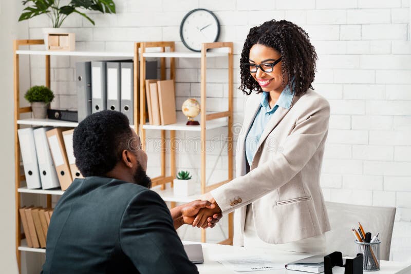 Black Hiring Manager Shaking Hands with Successful Vacancy Candidate ...