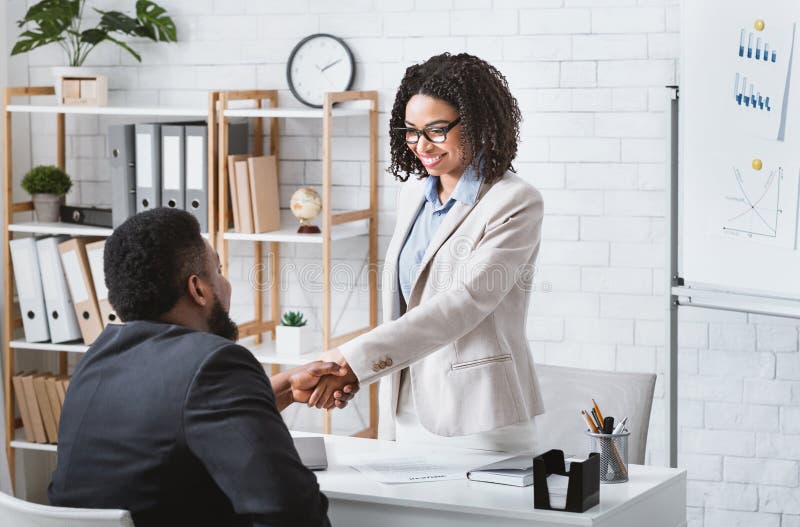 Black Hiring Manager Shaking Hands with Successful Vacancy Candidate ...