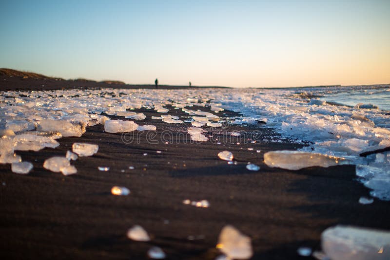 Black Ice beach in Iceland stock photo. Image of daughter - 238454662