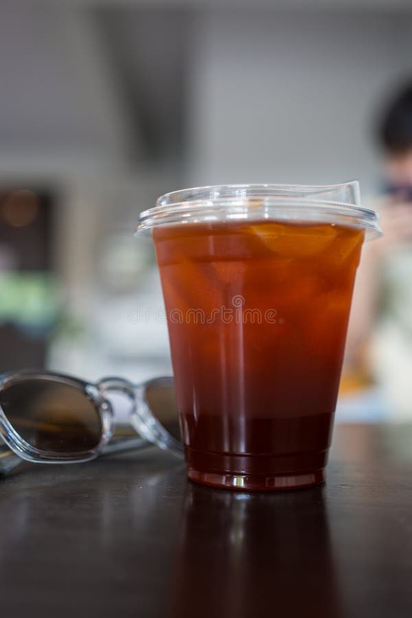 Black Iced Coffee on the Table at a Coffee Shop Stock Photo - Image of ...