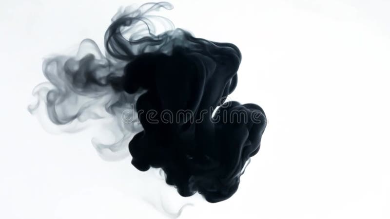 Black Ink is Creating Mesmerizing Patterns while Dissolving in a Clear ...