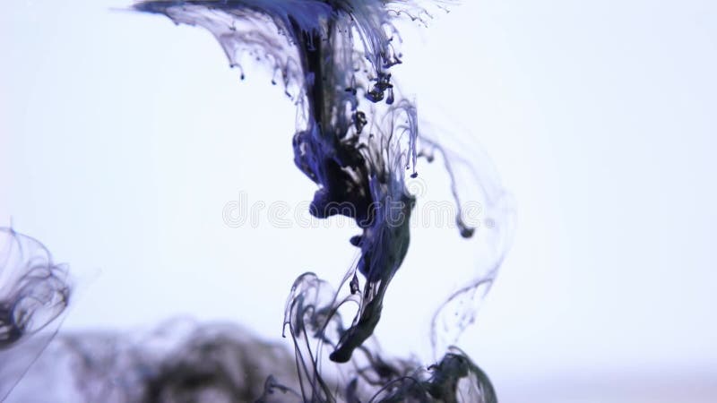 Black Ink Dripping in the Water and Spreading Everywhere Stock Footage ...