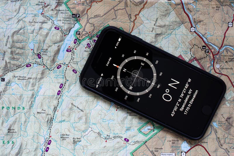 An IPhone Compass App on a Topographic Map Editorial Stock Image ...