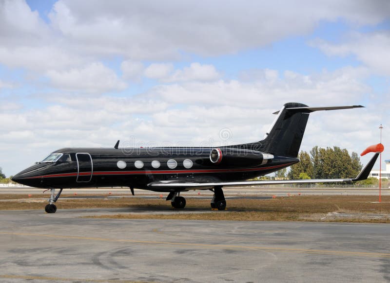 Black jet airplane stock image. Image of transport, corporate - 8926475