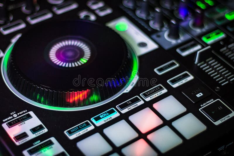 Black Jog Wheel of DJ Controller with Glowing Lights Around it Showing ...