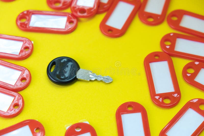The Black Key is among Empty Unsigned Tags Stock Image - Image of blank ...