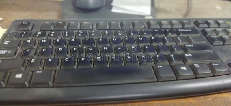 Black Keyboard on the Brown Table Under the Monitor Editorial Stock ...