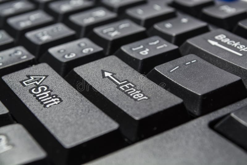 The Black Keyboard from the Computer. Keys Enter and Shift. Tool. Press ...